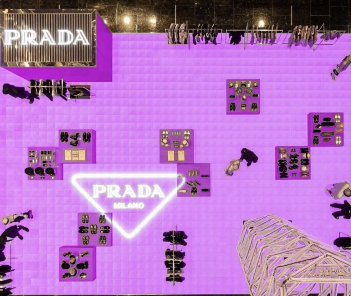 HYPNOTIC PURPLE PRADA POP-UP WITH GLOWING NEON TRELLIS TOWER TILL 31ST ...