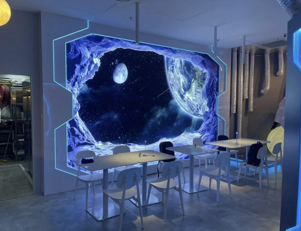 GALAXY-THEMED RESTAURANT WITH OUTER SPACE DECOR & ASTRONAUTS - Shout