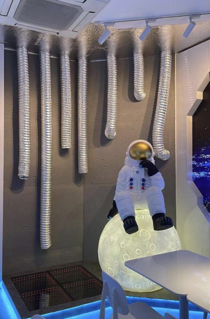 GALAXY-THEMED RESTAURANT WITH OUTER SPACE DECOR & ASTRONAUTS - Shout