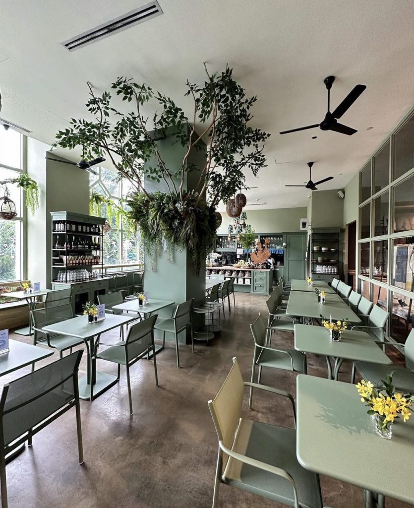THIS LUSH GARDEN-INSPIRED CAFÉ IS HIDDEN IN A FURNITURE STORE IN ...