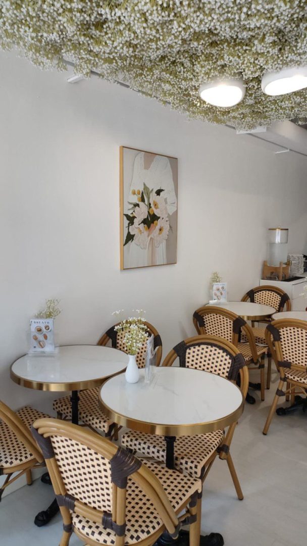 DREAMY PARISIAN-INSPIRED FLORAL CAFÉ WITH HANGING BABY’S BREATH CEILING ...