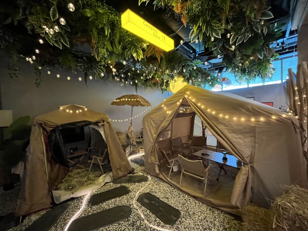 INDOOR CAMPING-THEMED GAME CAFÉ IN ORCHARD HAS COSY PRIVATE TENTS WITH ...