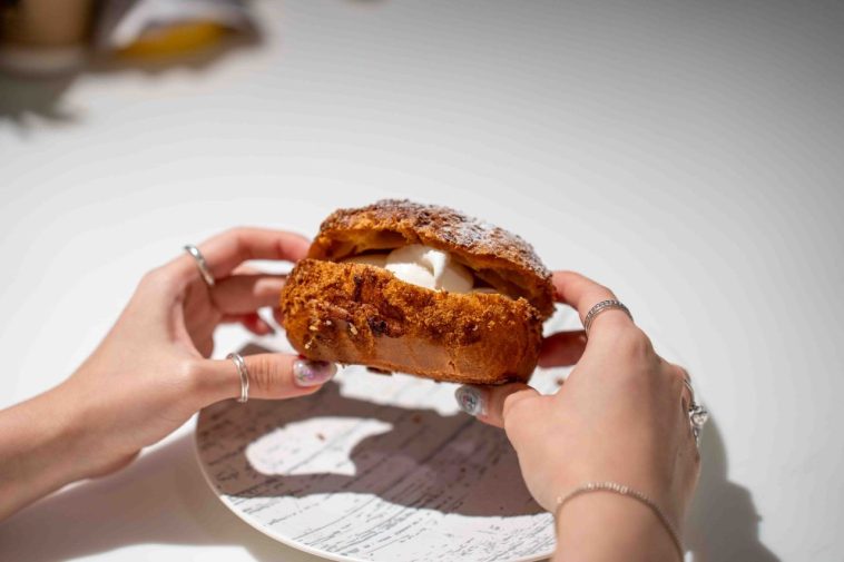 THIS DESSERT CAFÉ HIDDEN IN A BANK HAS SOFT SERVE STUFFED “CREAM PUFFS ...