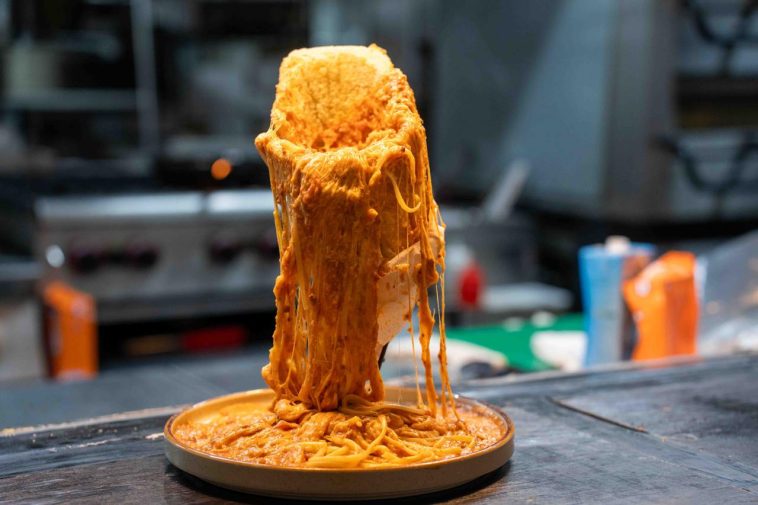 EXPLODING CHEESY PASTA “WATERFALL” SANDWICH AT THIS POPULAR ITALIAN ...