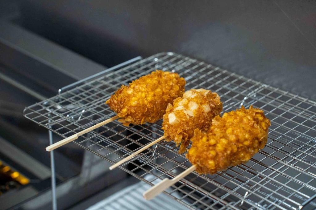 CHEESY KOREAN CORN DOGS COATED WITH CRUNCHY CORNFLAKES & POTATO CHUNKS ...